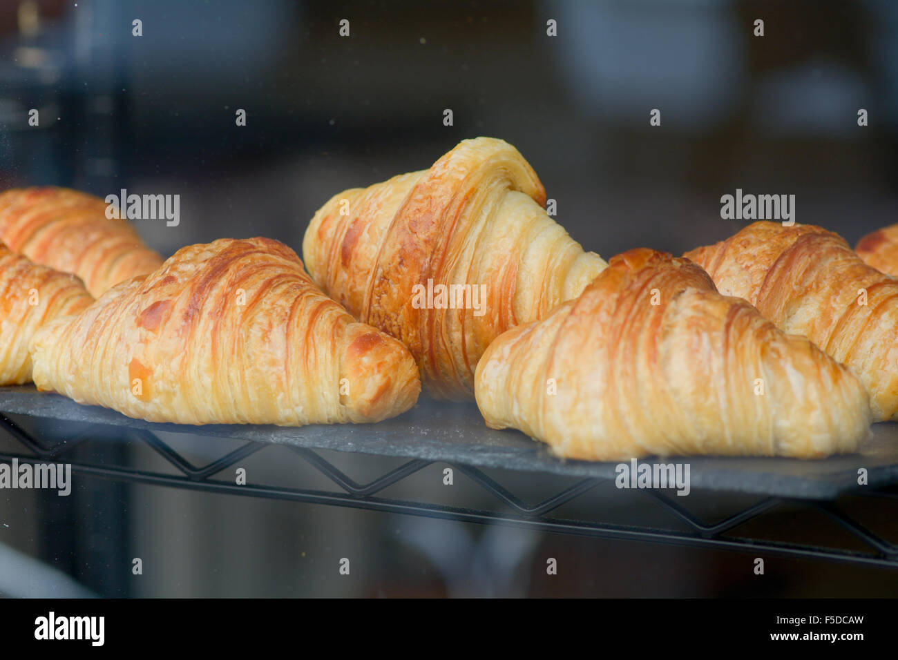 Small croissants in bakery window Stock Photo - Alamy