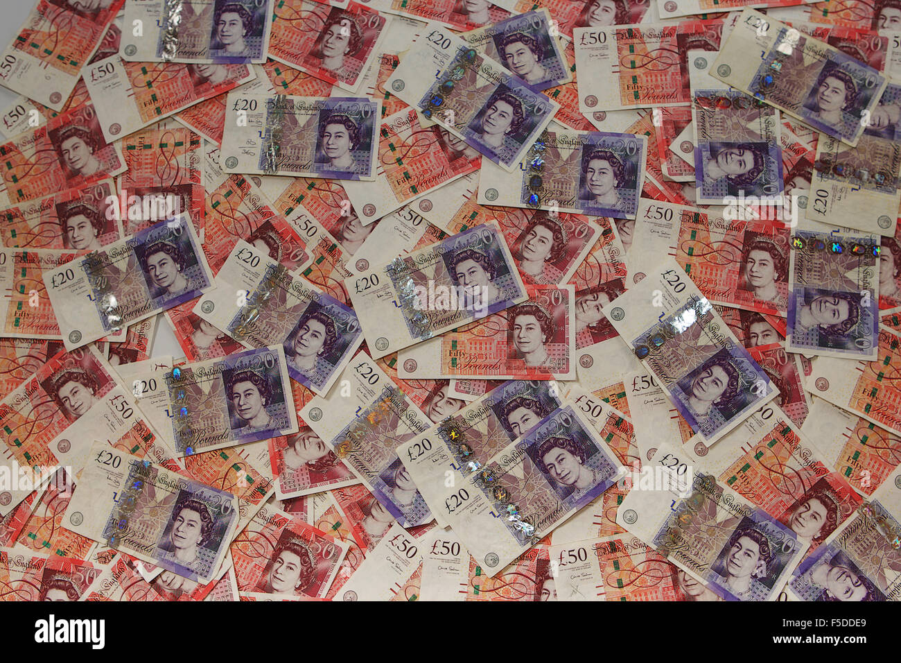 Pile of bank notes uk hi-res stock photography and images - Alamy