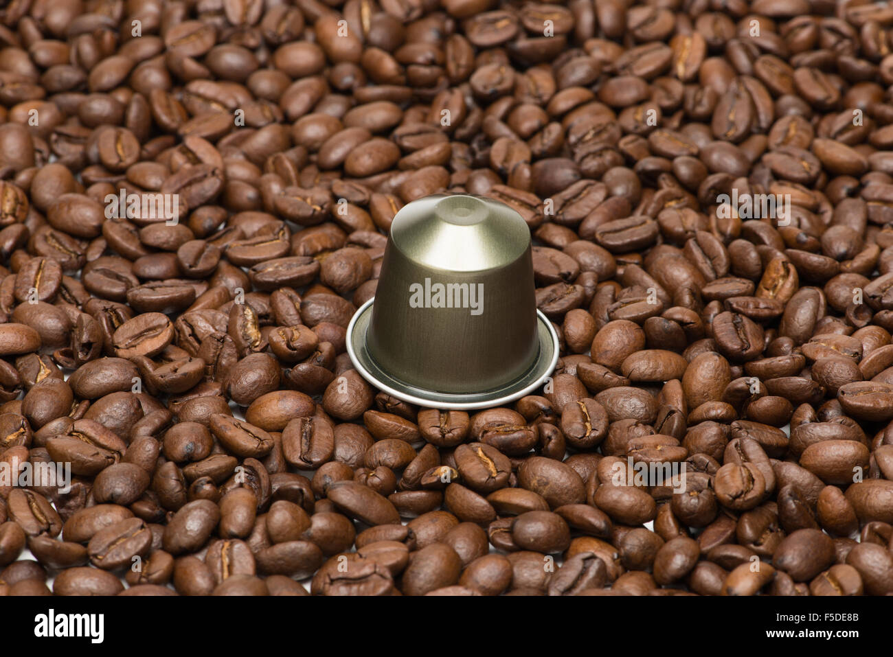 Seed of coffee with capsule on white background Stock Photo - Alamy