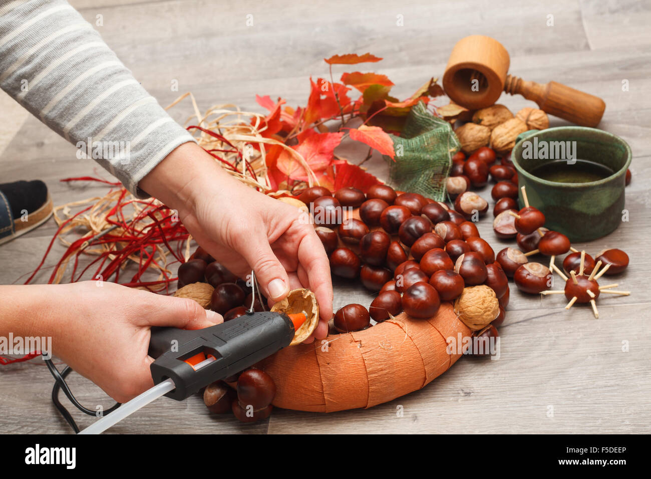 Handmade production of Christmas wreaths using weld gun (Shallow DOF ...