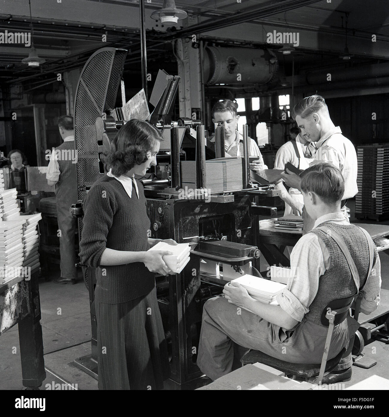 1950s historical, young workers in print room Stock Photo - Alamy