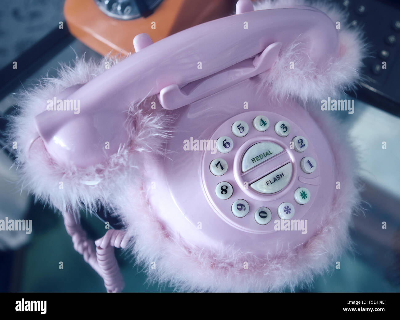 Retro pink rotary telephone hi-res stock photography and images - Alamy
