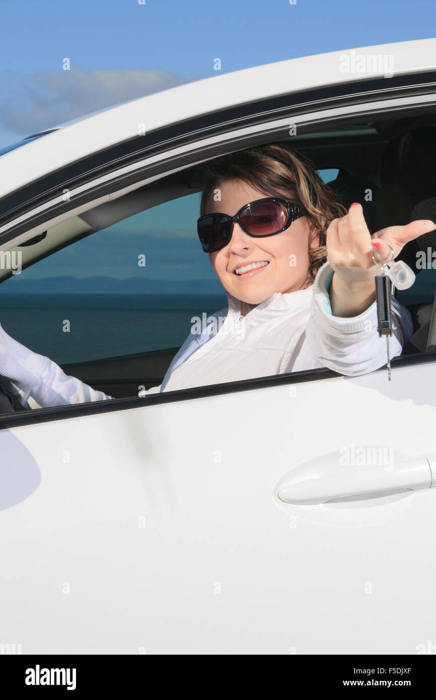 Car. Woman driver happy smiling Stock Photo - Alamy