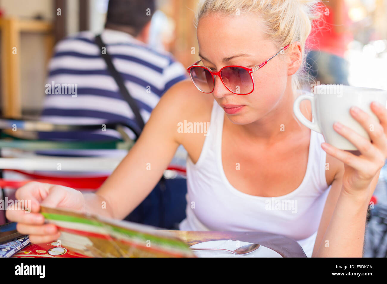 Woman drinking coffee outdoor on street Stock Photo - Alamy