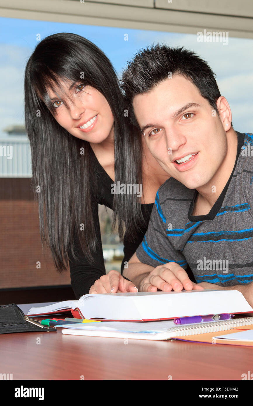 Couple student library Stock Photo - Alamy