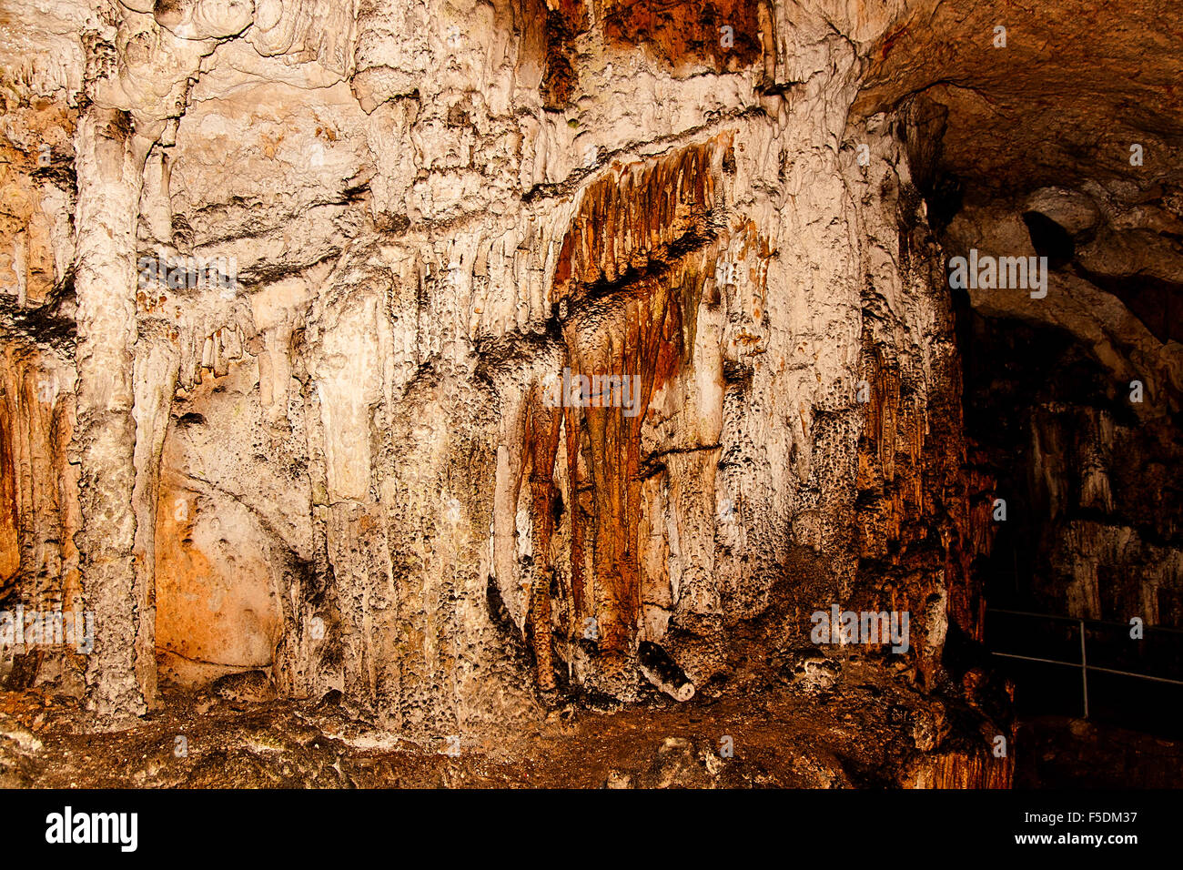 Inside view of an underground cavern or cave with stalagmites and ...