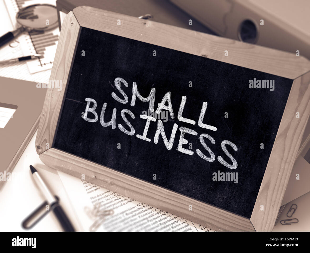 Handwritten Small Business on a Chalkboard Stock Photo - Alamy