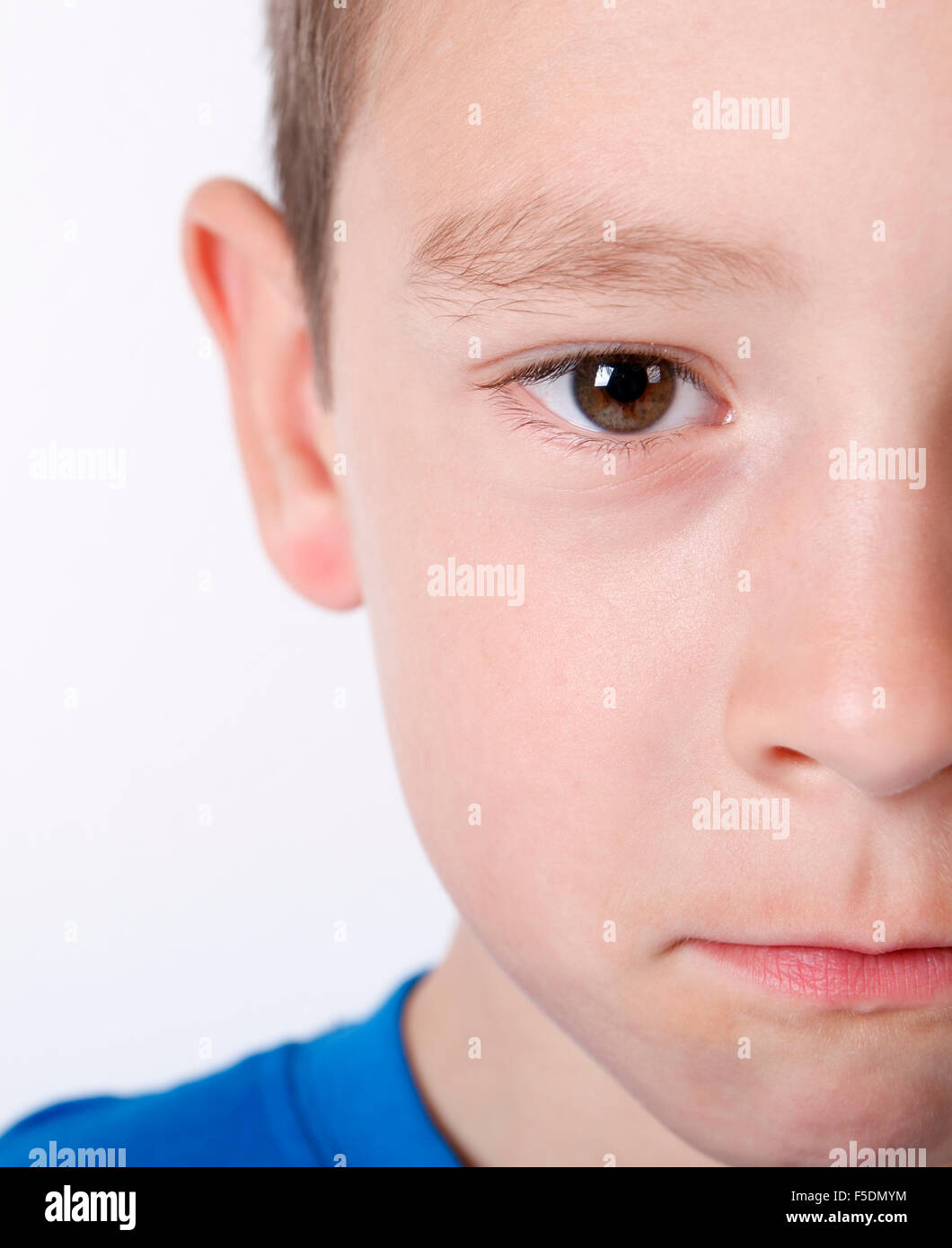 Photo of adorable young happy boy looking at camera Stock Photo - Alamy