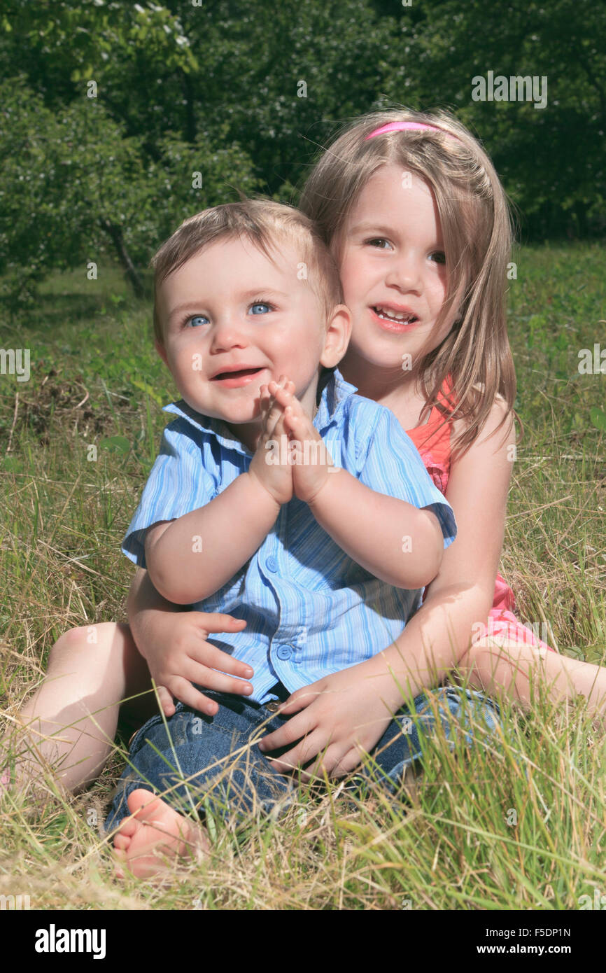 portrait of two member of a family. Brother and sister Stock Photo - Alamy