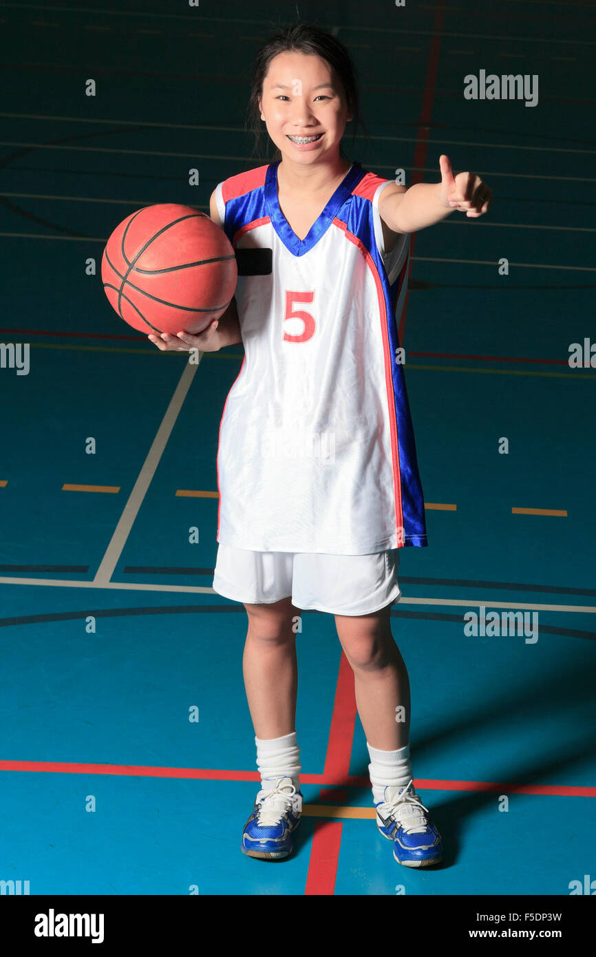 A asian basketball player in gymnase field Stock Photo - Alamy