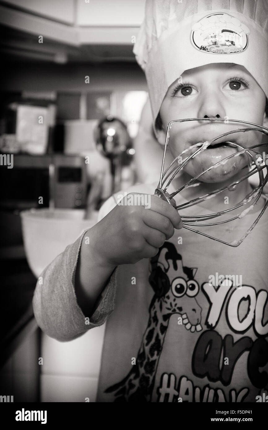 Child eating messy cake hi-res stock photography and images - Alamy