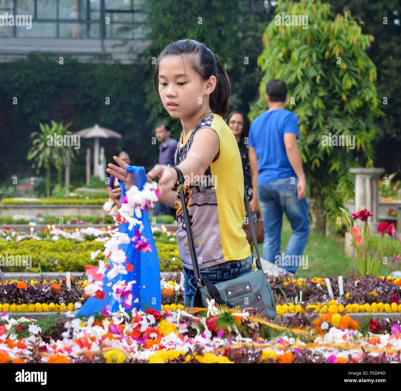 Girl offers flowers hi-res stock photography and images - Alamy