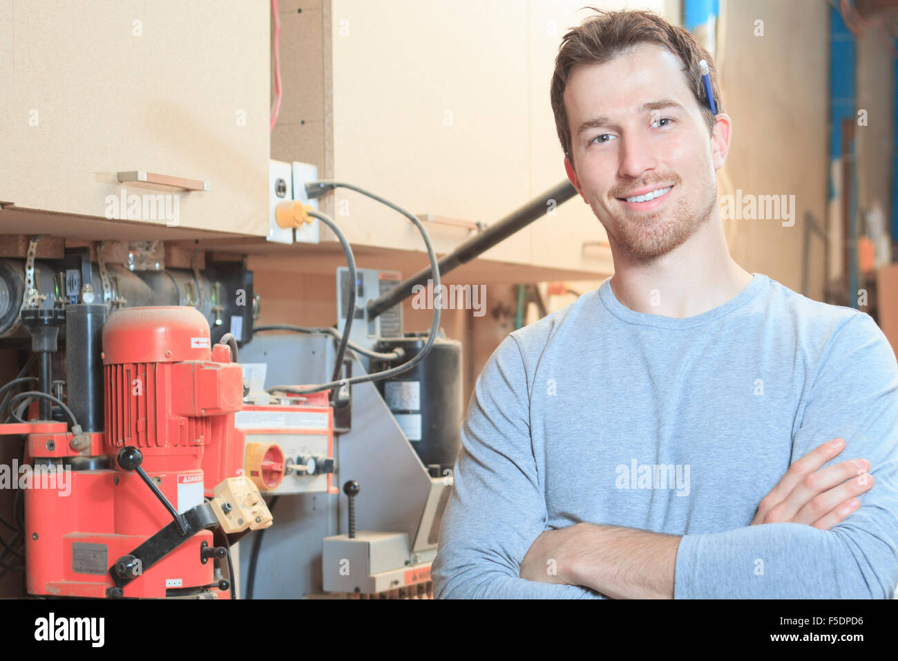 A carpenter working hard at the workshop Stock Photo - Alamy