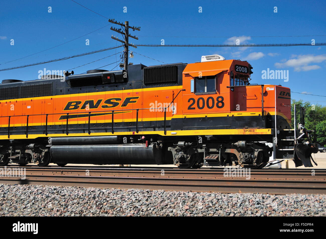 A single Burlington Northern Santa Fe locomotive unit sits on the main line in Rochelle ...