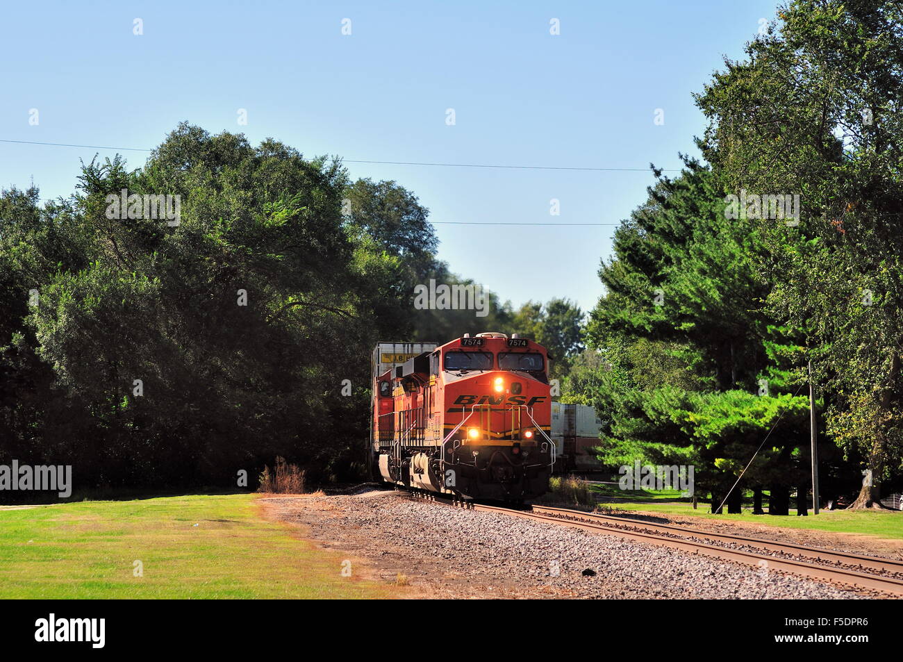 A Burlington Northern Santa Fe freight train as it rumbles through a ...