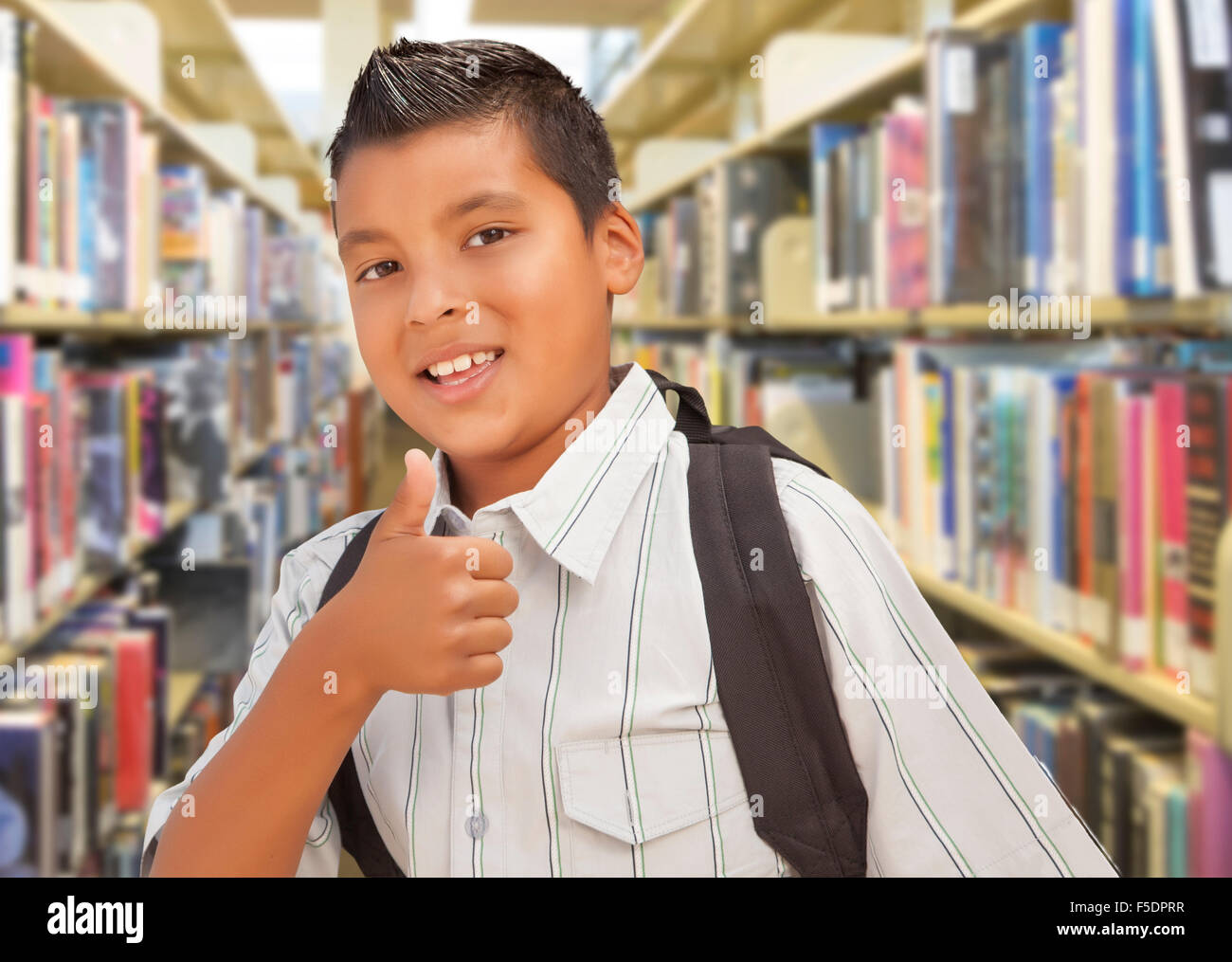Handsome Hispanic Student Boy with Back Pack and Thumbs Up in the ...