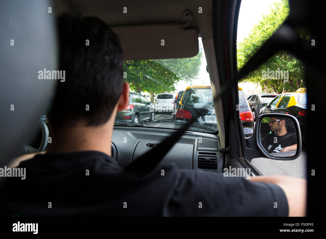 Young man at car's passenger seat on a traffic jam Stock Photo - Alamy