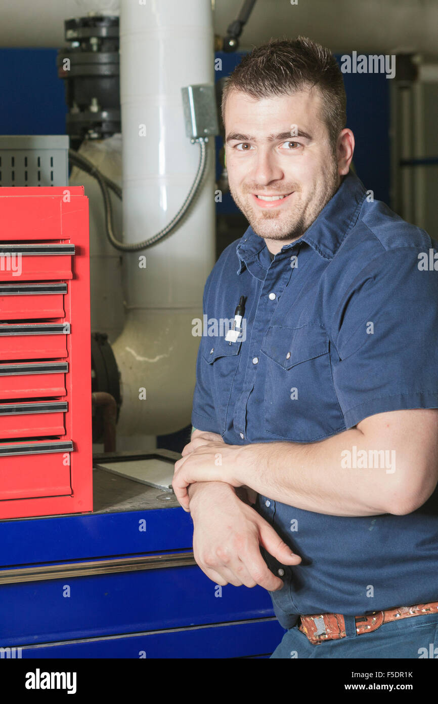 industrial technician inside a industrial place Stock Photo - Alamy