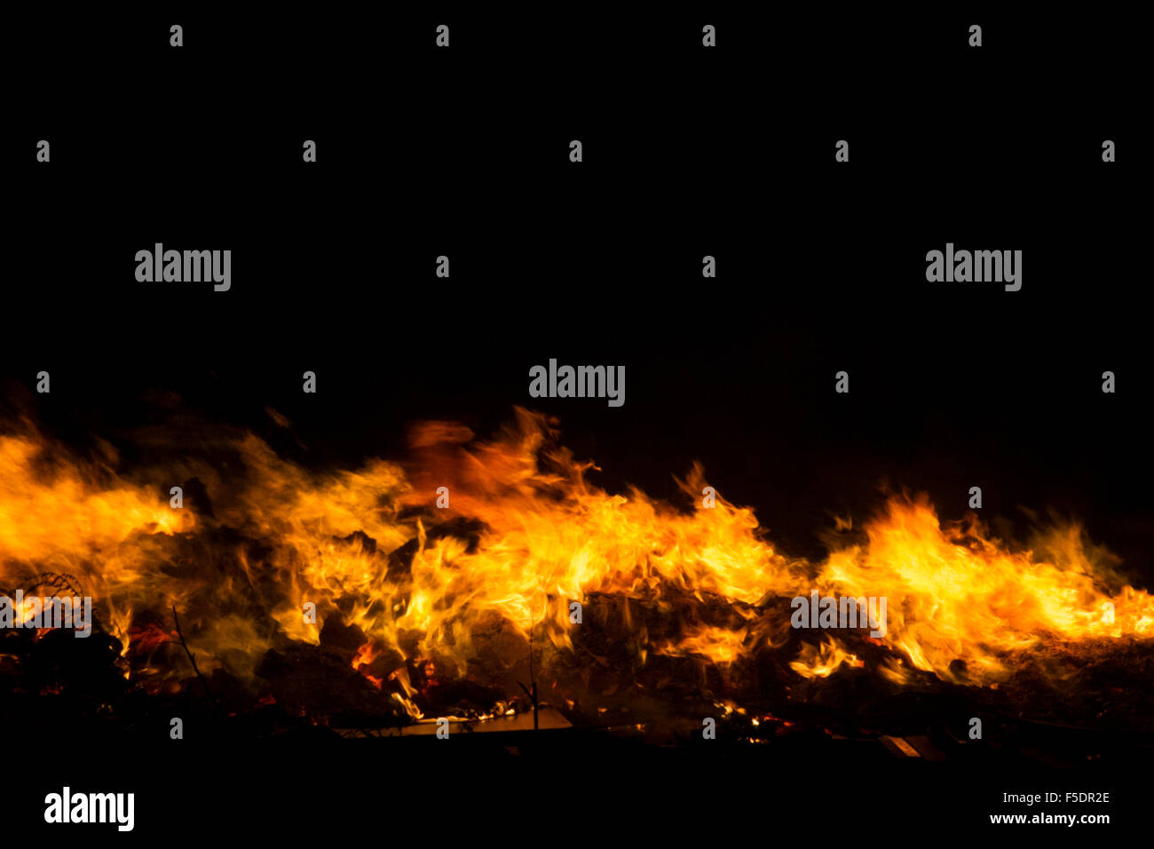 landscape orientation of fire, with black background and space at the ...