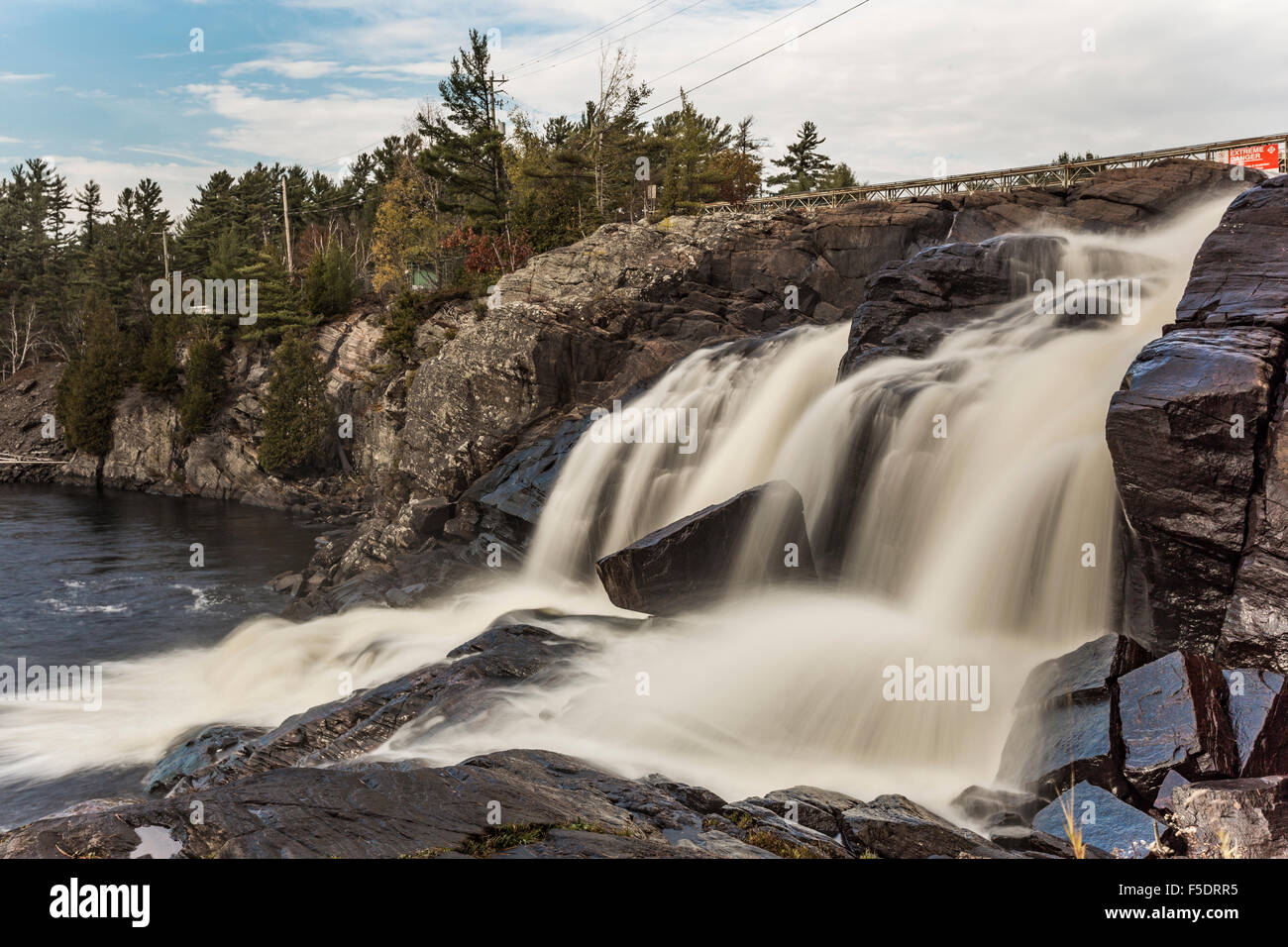Strong flow of High Falls in Bracebridge, Ontario Stock Photo - Alamy