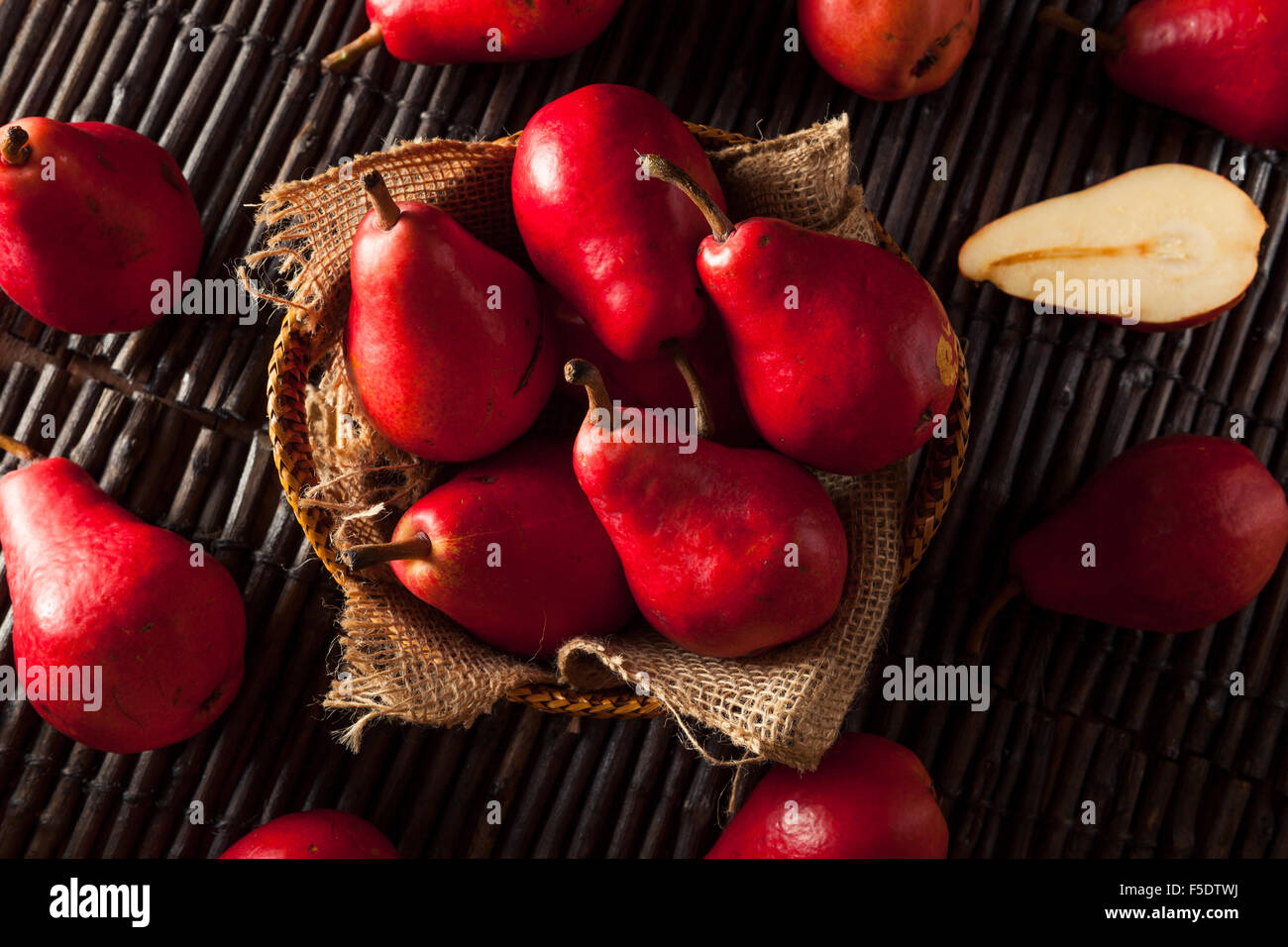 Raw Organic Red Pears in a Basket Stock Photo - Alamy