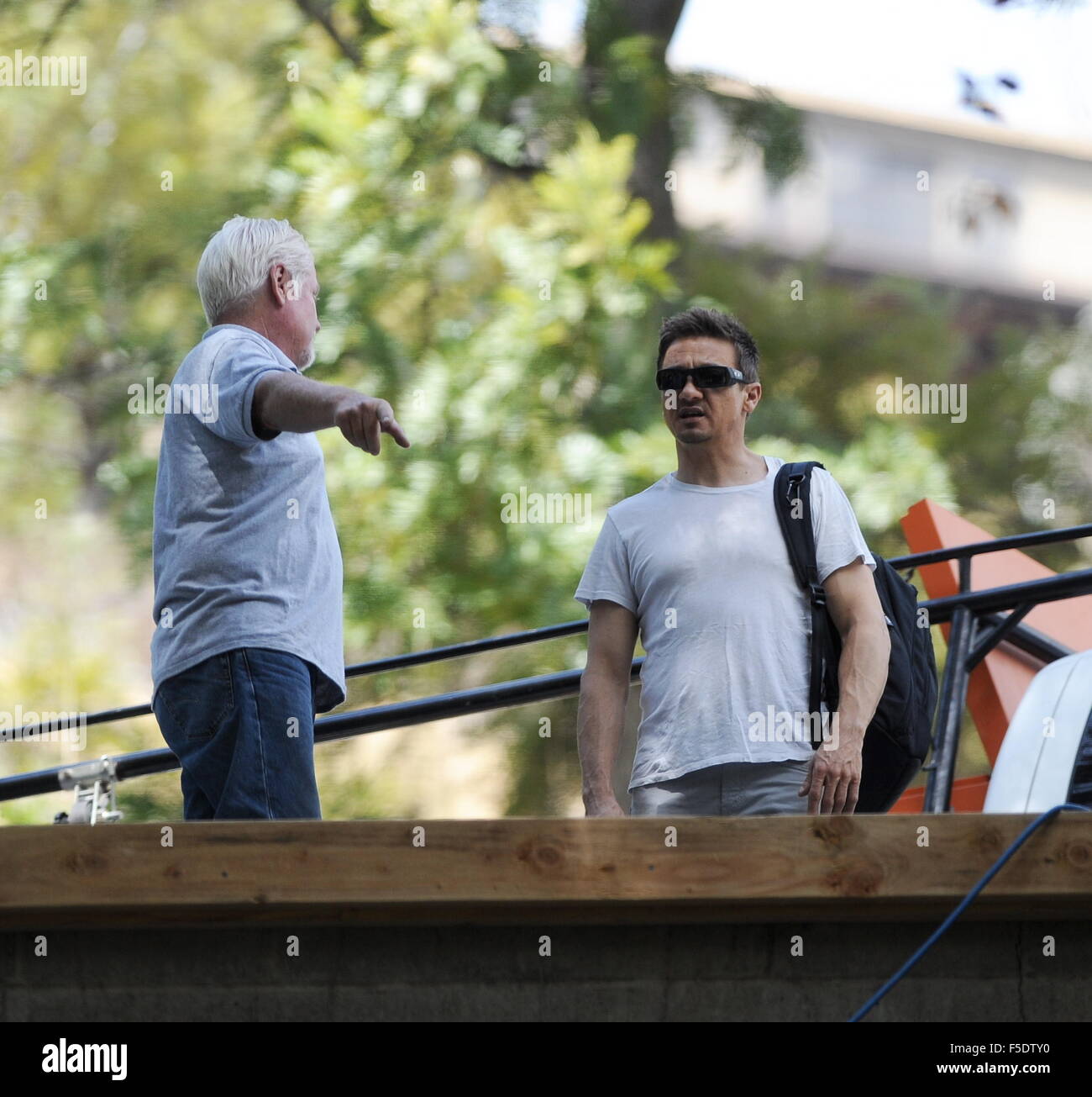 Actor Jeremy Renner checks out the progress of his new hollywood hills ...