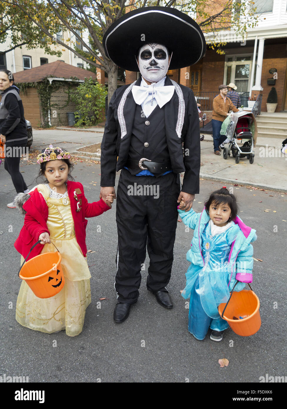 Mexican family trick-or-treating n the Kensington section of Brooklyn ...