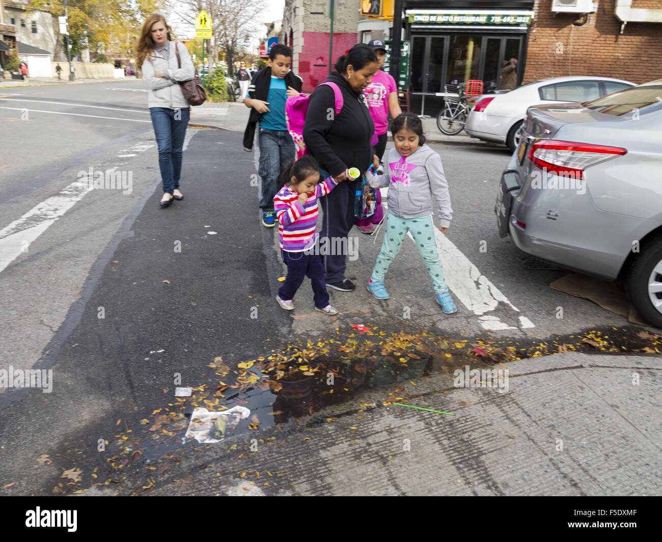 Children going home with their mother after school in Ditmas Park ...