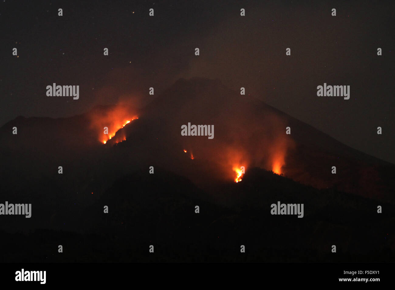 Visible fire smoldering Mount Merapi, seen from Selo, Boyolali, Central ...