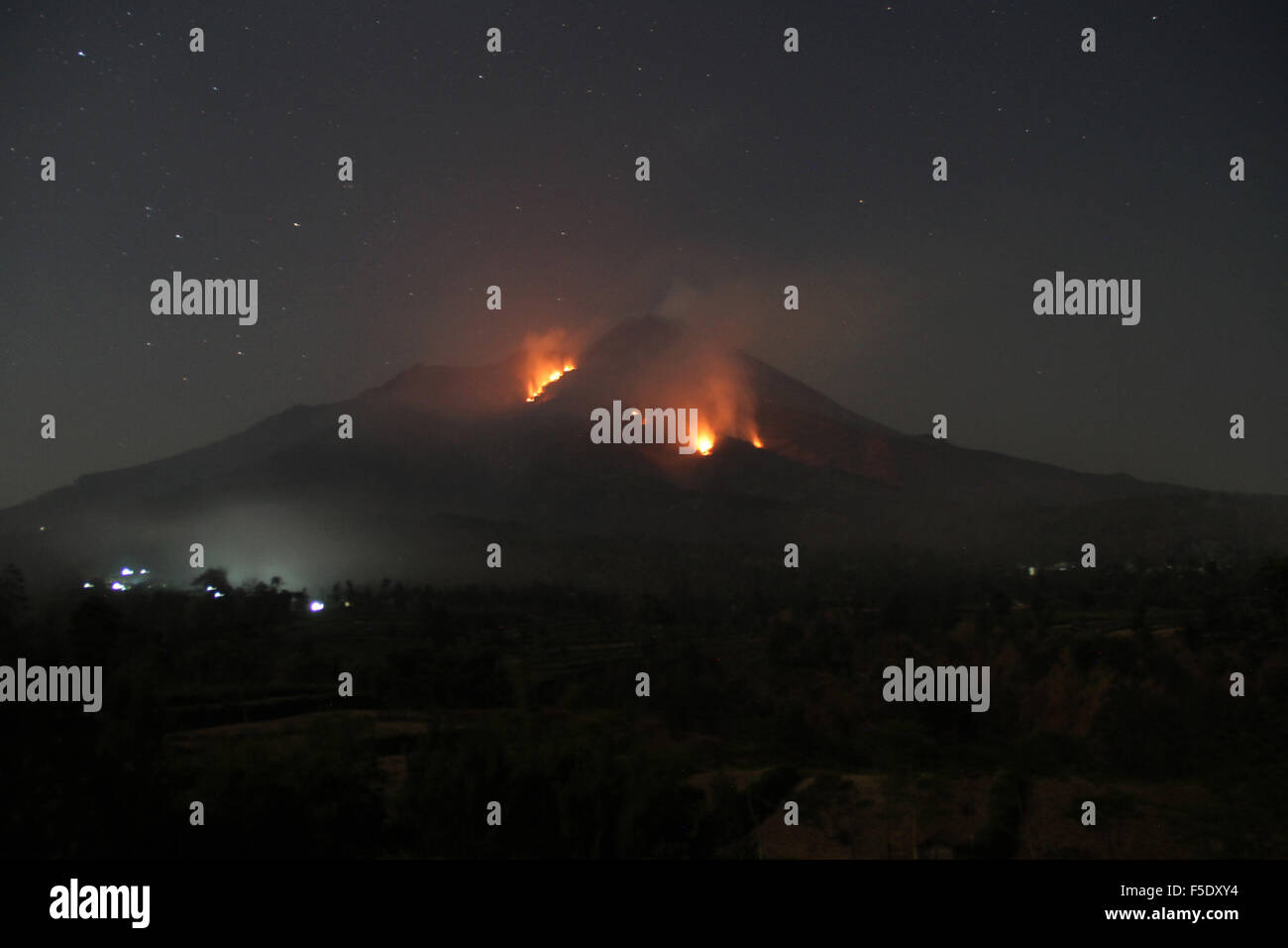 Visible fire smoldering Mount Merapi, seen from Selo, Boyolali, Central ...
