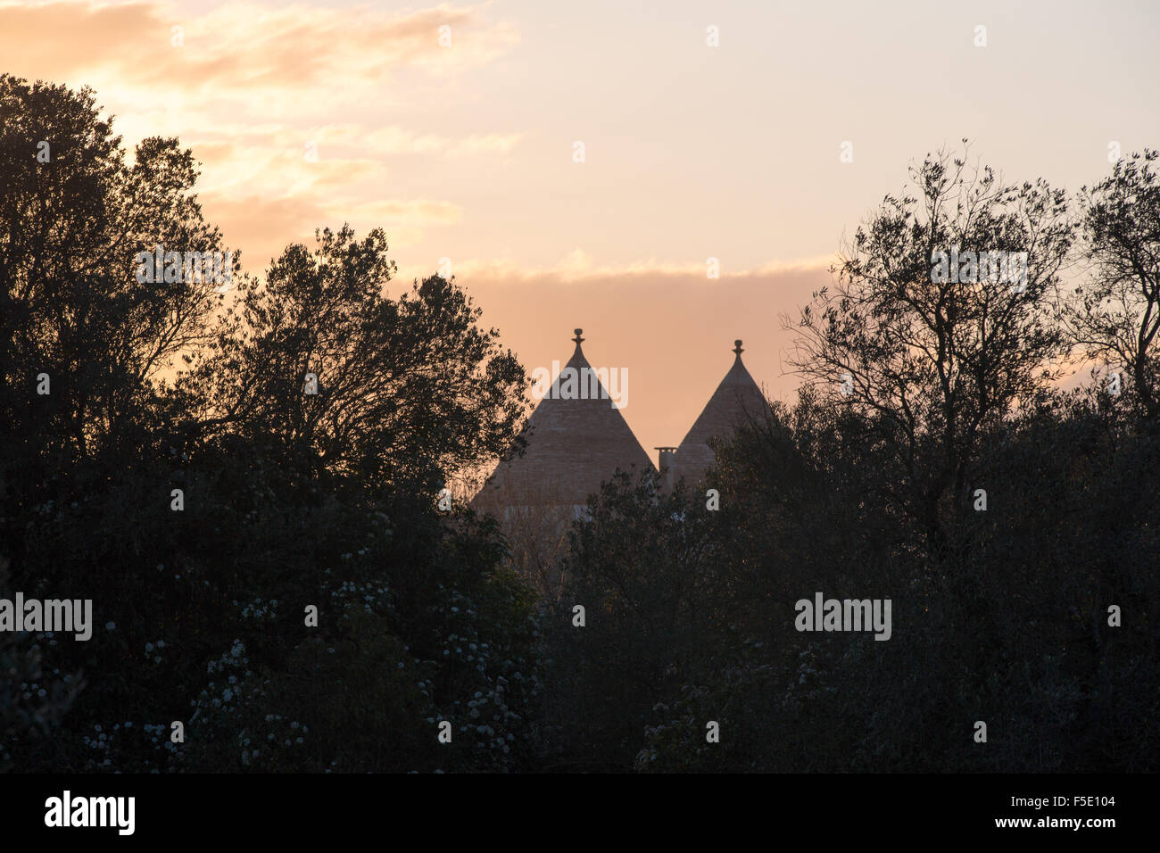 Trulli near Alberobello in the evening sun Stock Photo - Alamy