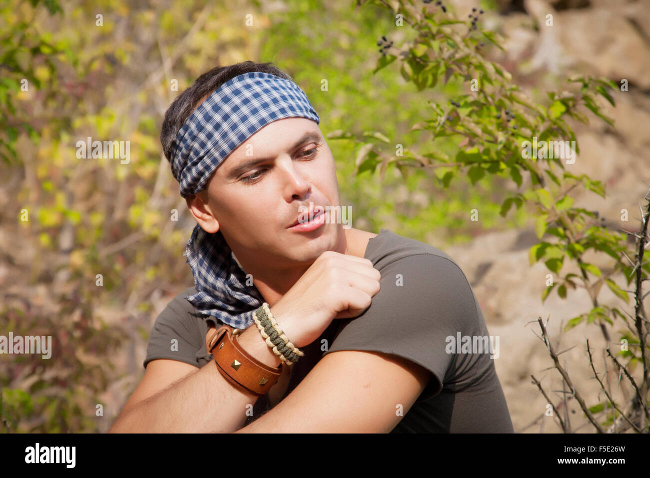 Portrait of an attractive young man on nature Stock Photo - Alamy