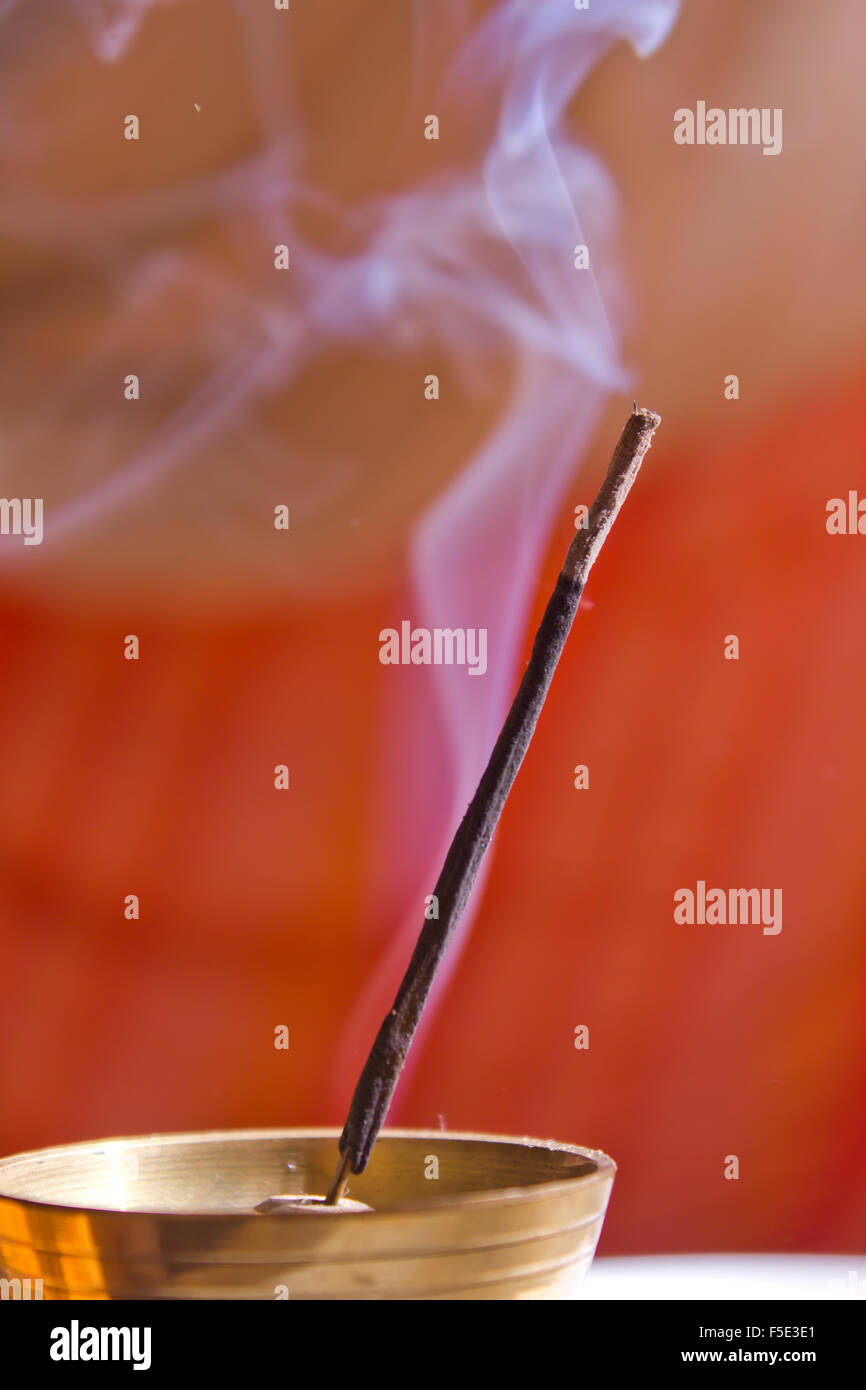 Fuming incense stick Stock Photo - Alamy