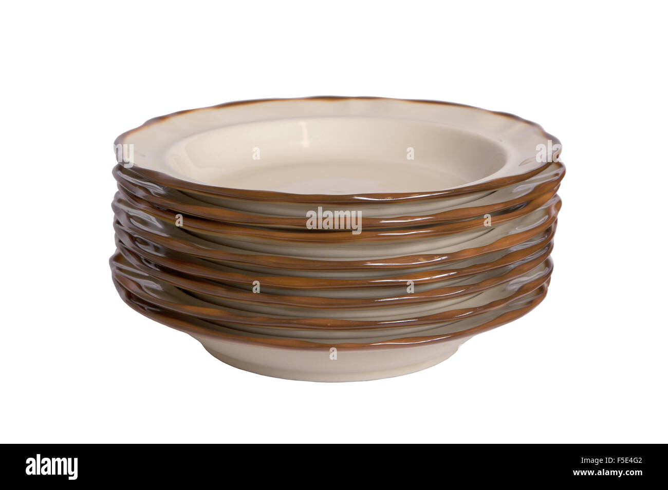 Vintage empty plates on a white background Stock Photo - Alamy