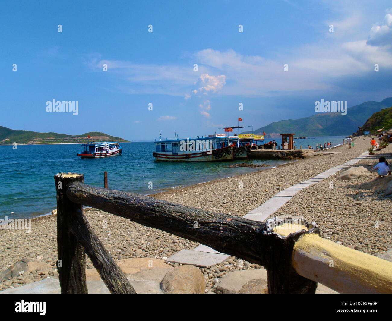 Small boat at sea on clear water in Nha Trang, Vietnam Stock Photo - Alamy