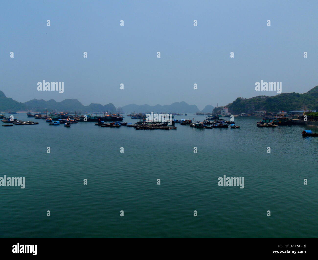 Traditional asian floating village at Halong Bay, Vietnam Stock Photo ...