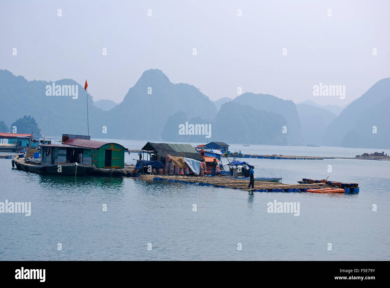Traditional asian floating village at Halong Bay, Vietnam Stock Photo ...