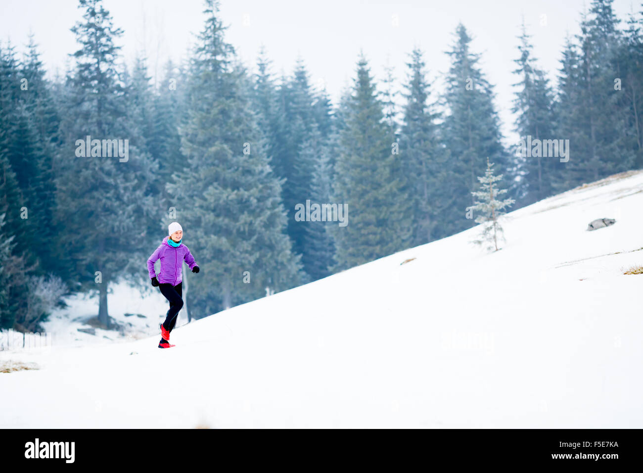 Winter running woman. Sport, fitness, jogging inspiration and ...