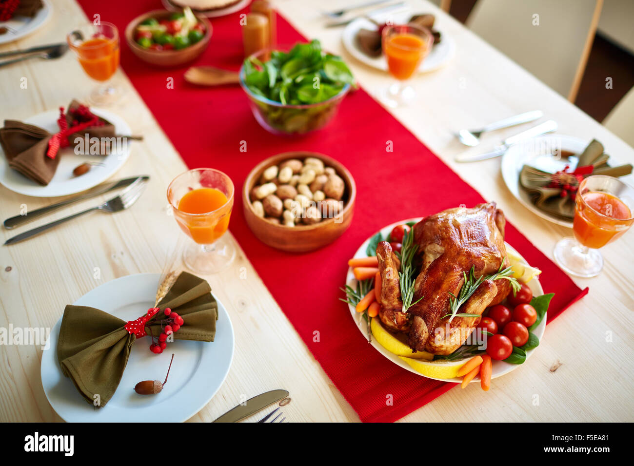 Roasted poultry and other traditional food on served table Stock Photo ...