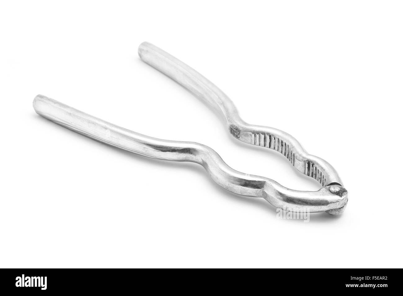 old nut cracker on white Stock Photo - Alamy