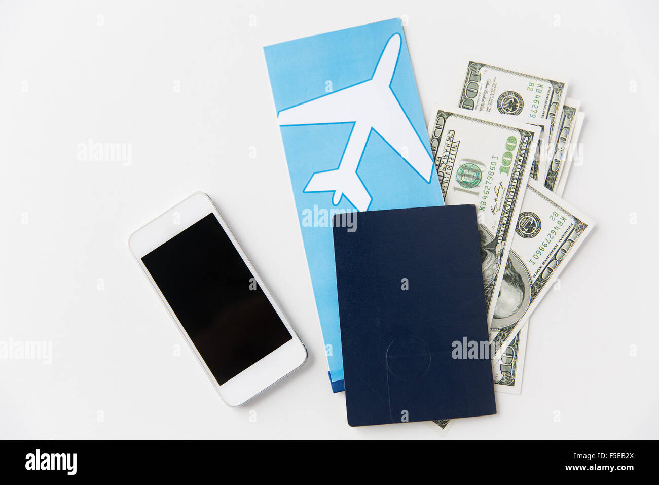 air ticket, money, smartphone and passport Stock Photo - Alamy