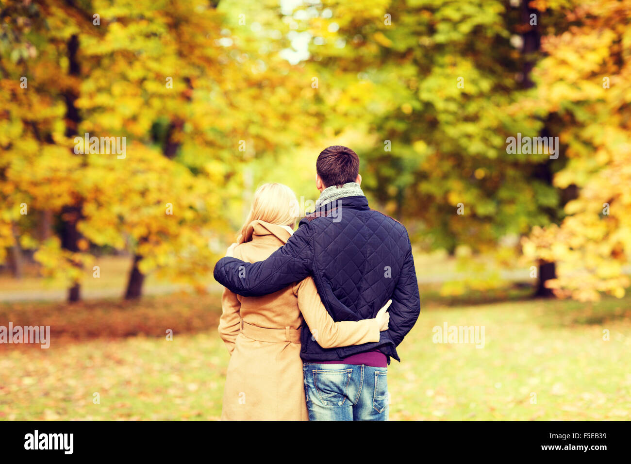 Woman hugging man from back hi-res stock photography and images - Alamy