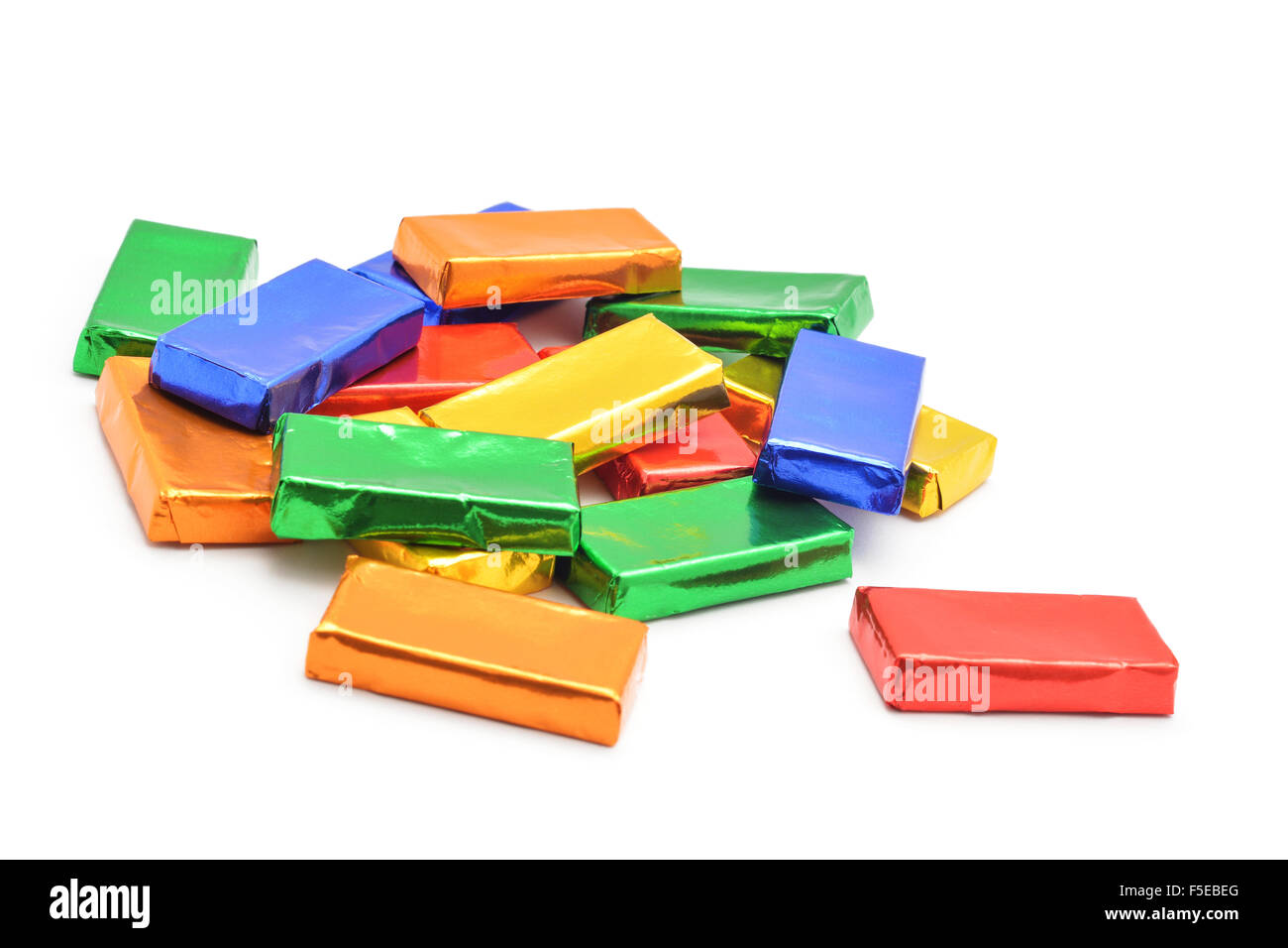 wrapped chocolate candy on white Stock Photo - Alamy