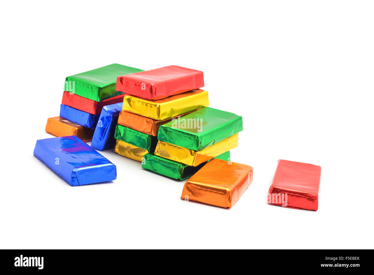 wrapped chocolate candy on white Stock Photo - Alamy