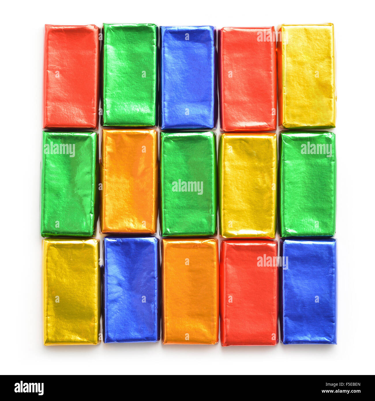 wrapped chocolate candy on white Stock Photo - Alamy