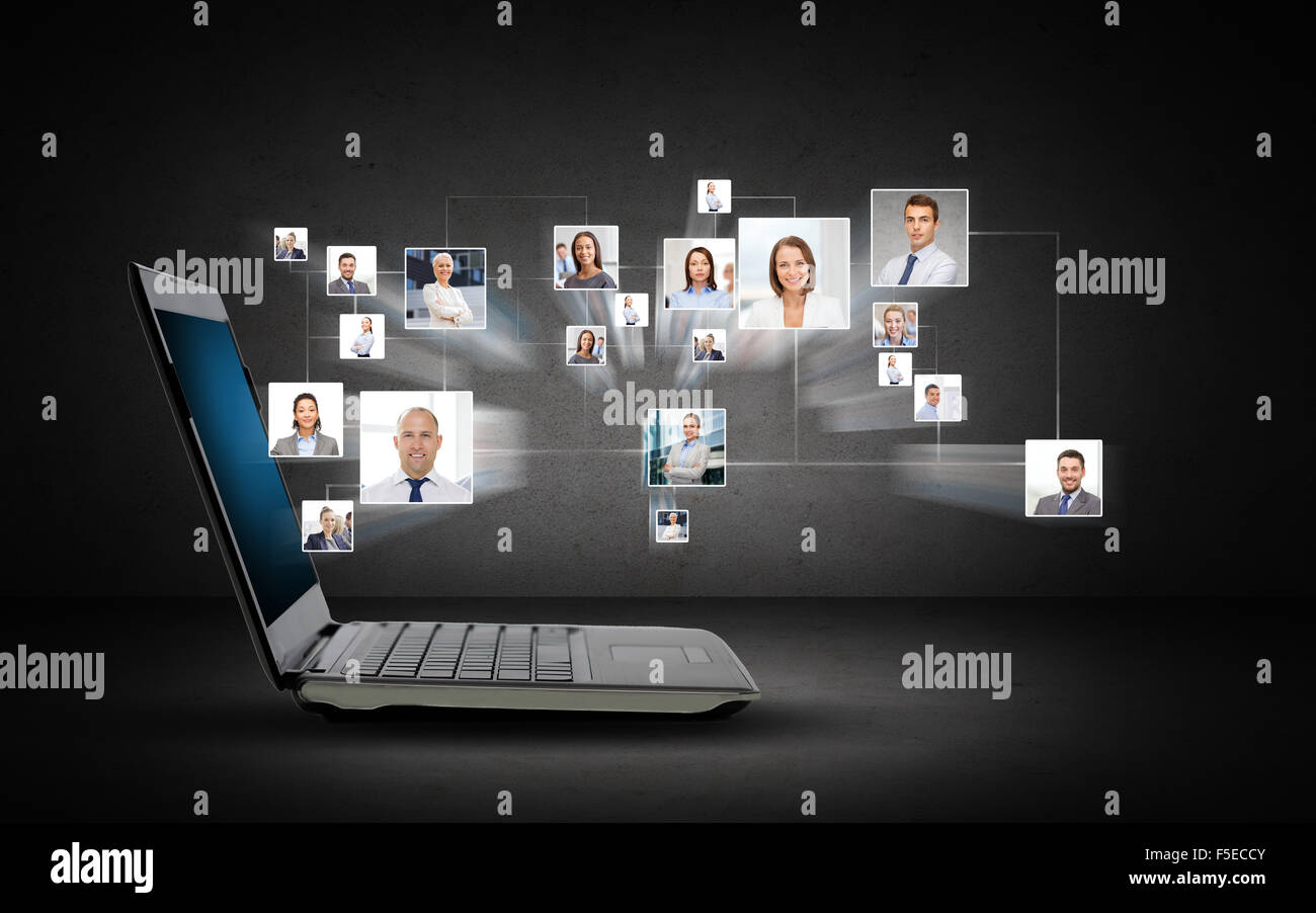 laptop computer with internet contacts projection Stock Photo - Alamy