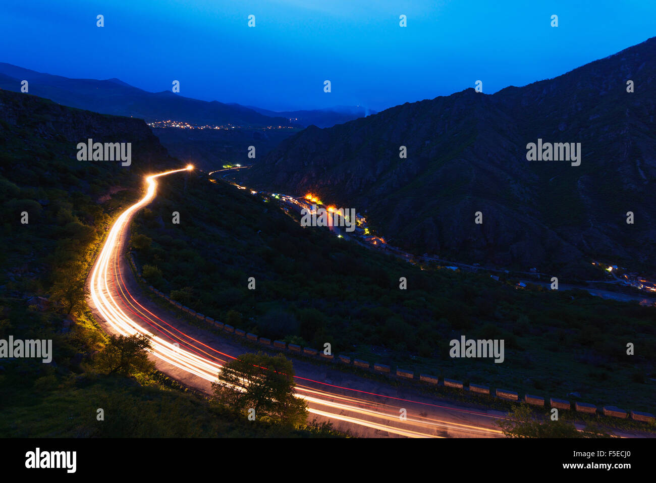 Car lights on mountain road, Lori Province, Armenia, Caucasus, Central ...