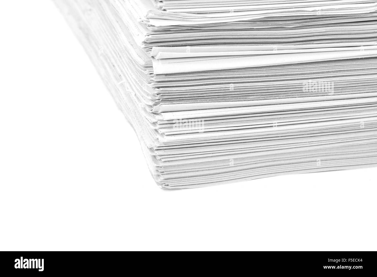 paper stack closeup on white Stock Photo - Alamy