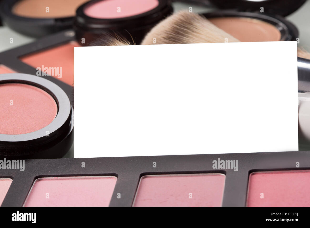 makeup cosmetics for eyes and bussiness card Stock Photo - Alamy