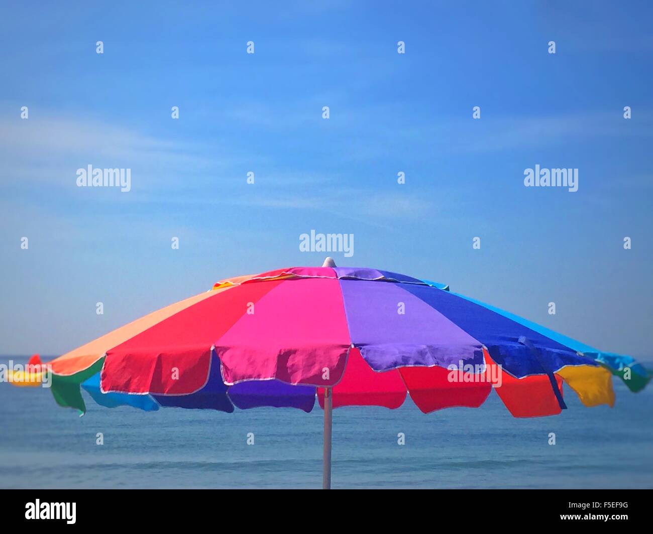 Close-up of colorful parasol on the beach Stock Photo - Alamy